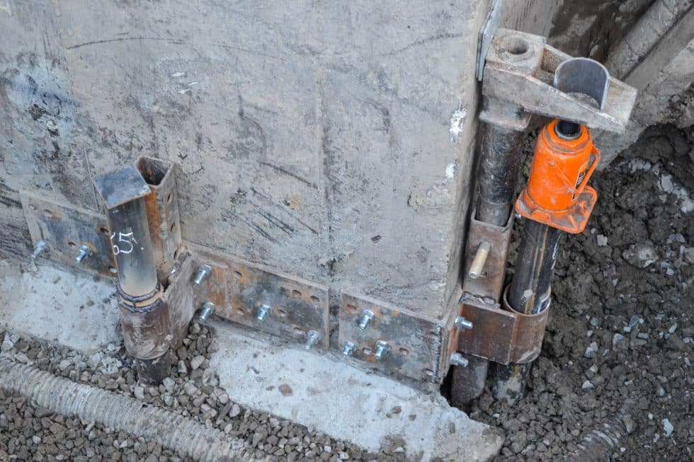 Foundation Levelling. Underpinning the foundation to level a house.